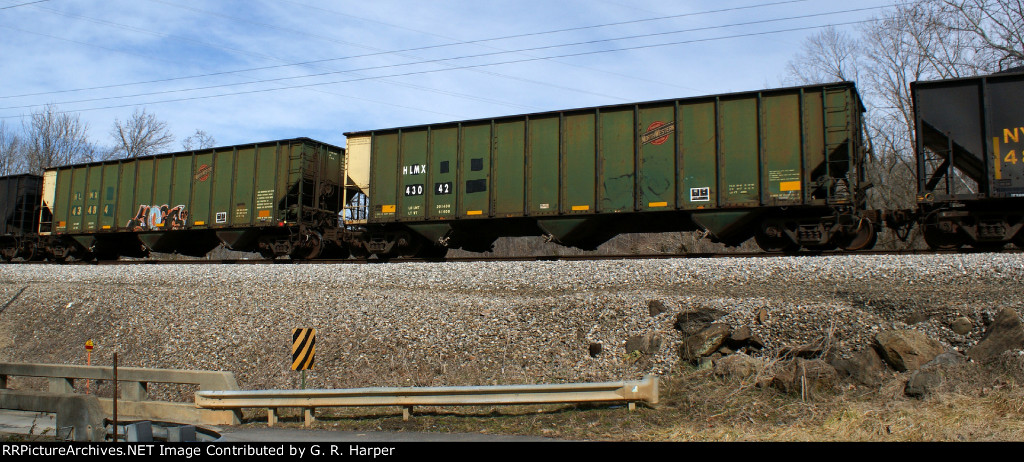 Ex- C&NW hopper cars on T25727. This train had an interesting collection of run-down hopper cars.